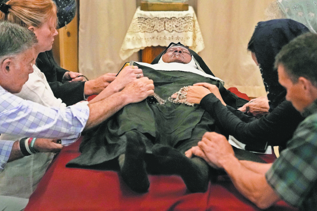Nun whose body shows little decay since 2019 death draws hundreds to ...
